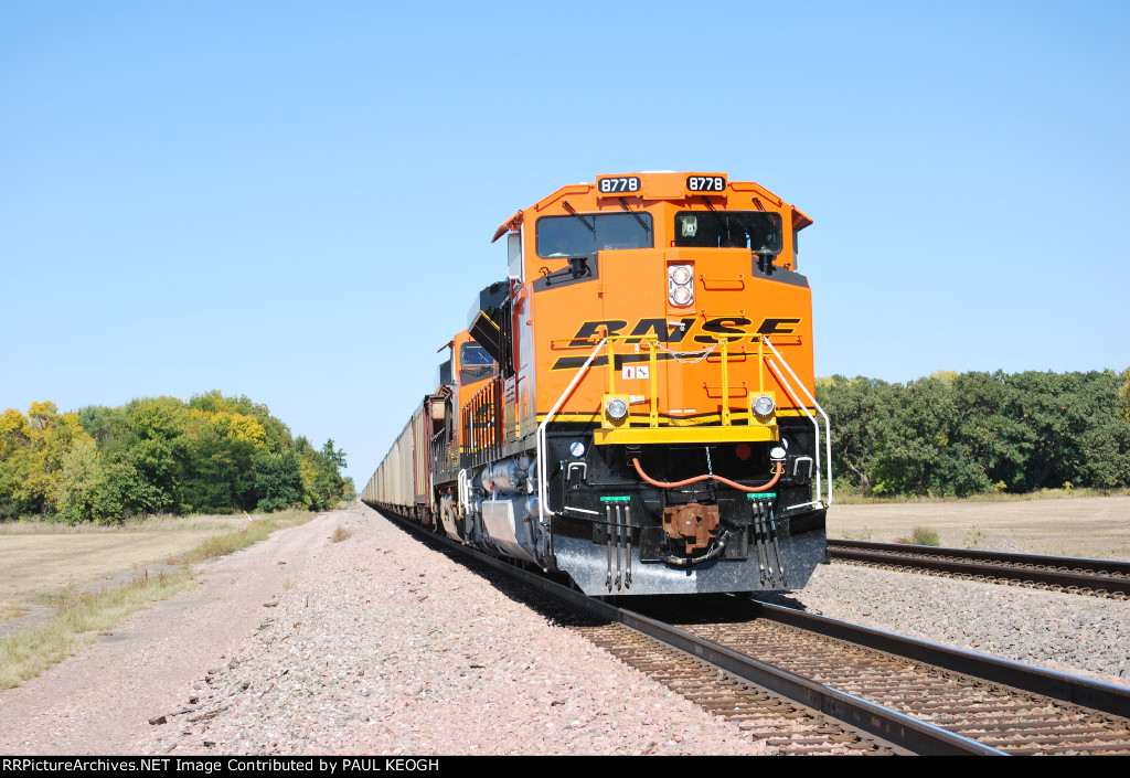 BNSF 8778 and BNSF 6246 and 126 Loaded Coal Cars and a ES44AC as the Rear DPU.